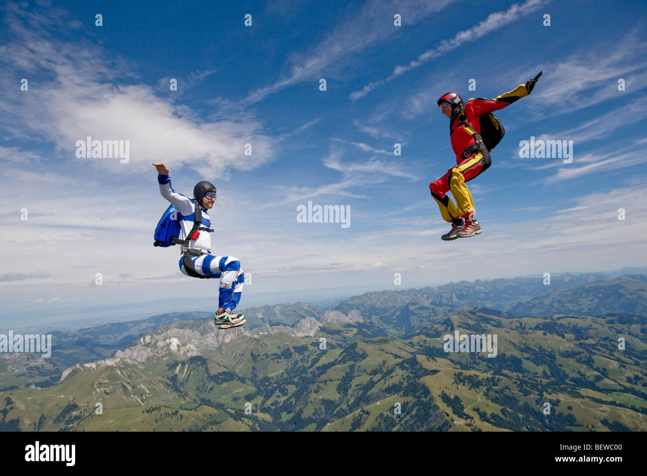 two people doing parachute jumping, full shot Stock Photo - Alamy