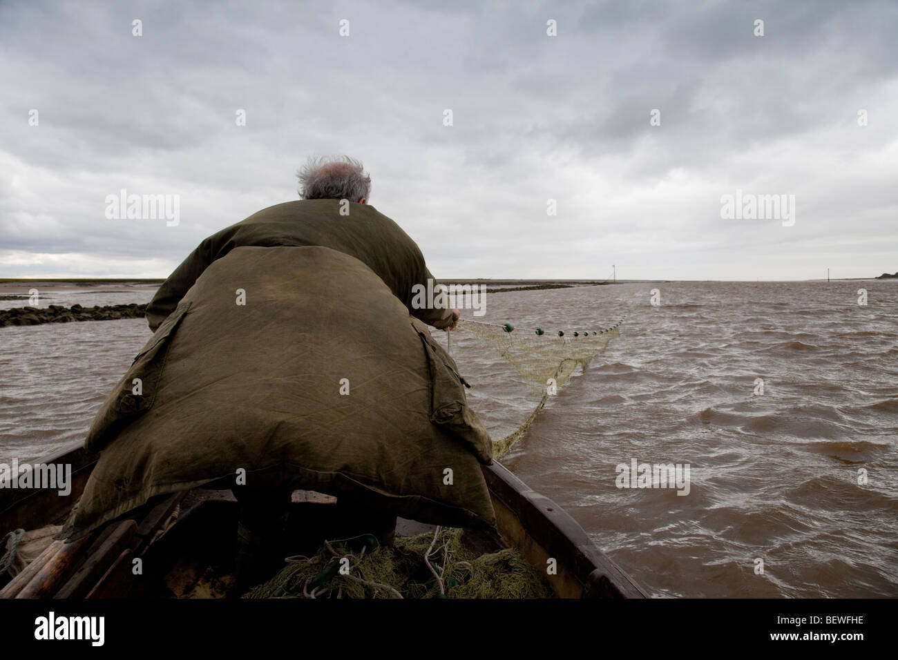 Commercial salmon fisherman with net on the River Ribble Uk Stock Photo ...
