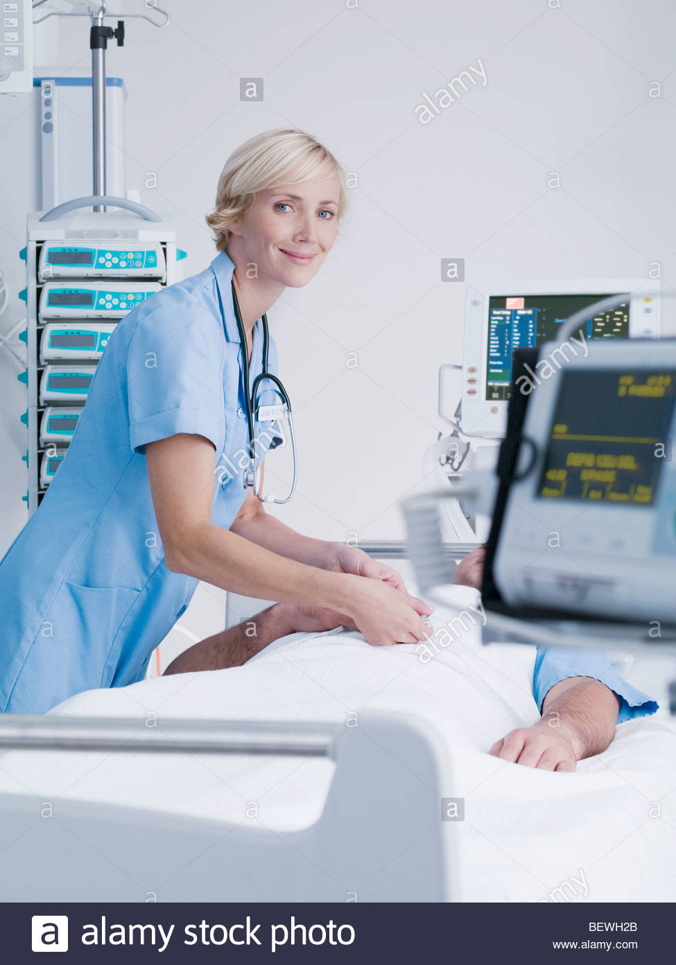 Nurse Bending Stock Photos & Nurse Bending Stock Images - Alamy
