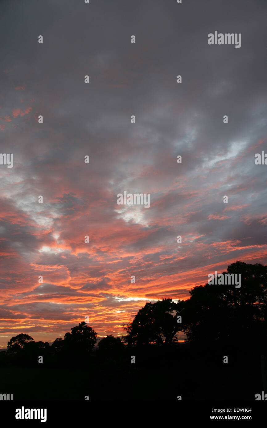 Village of Coddington, England. Dramatic sunset view over rural ...