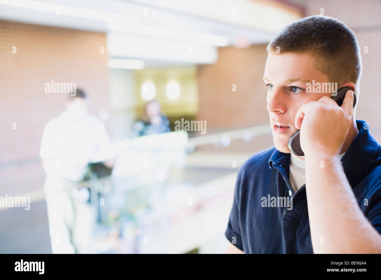 Student talking on a mobile phone Stock Photo - Alamy