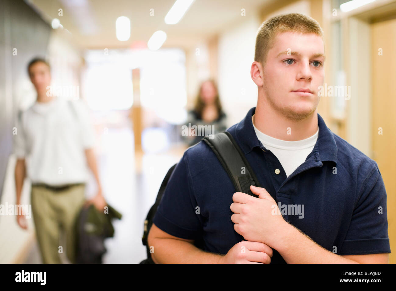 Close-up of a student in a corridor Stock Photo - Alamy