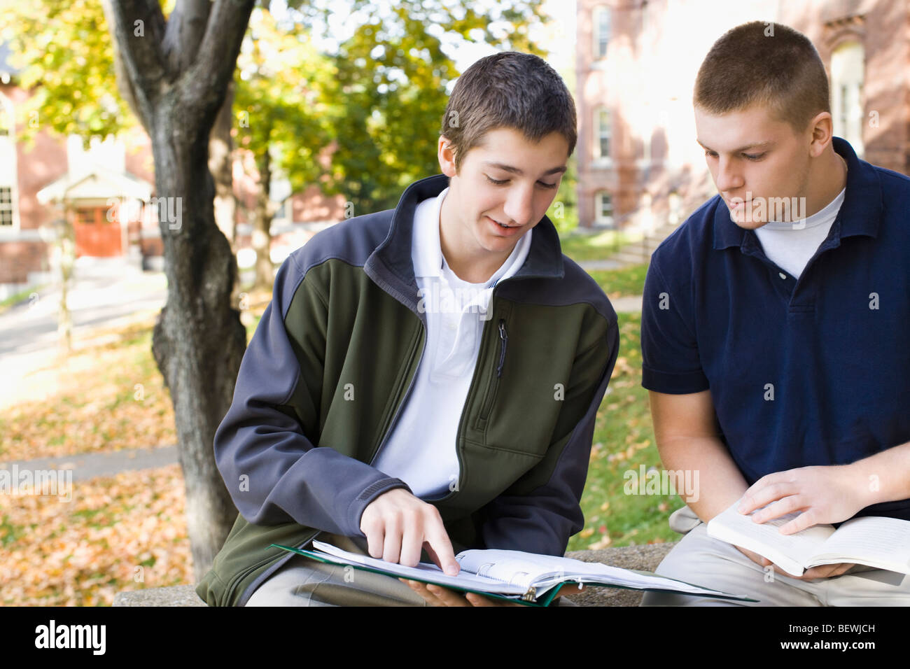 Two students reading books Stock Photo - Alamy
