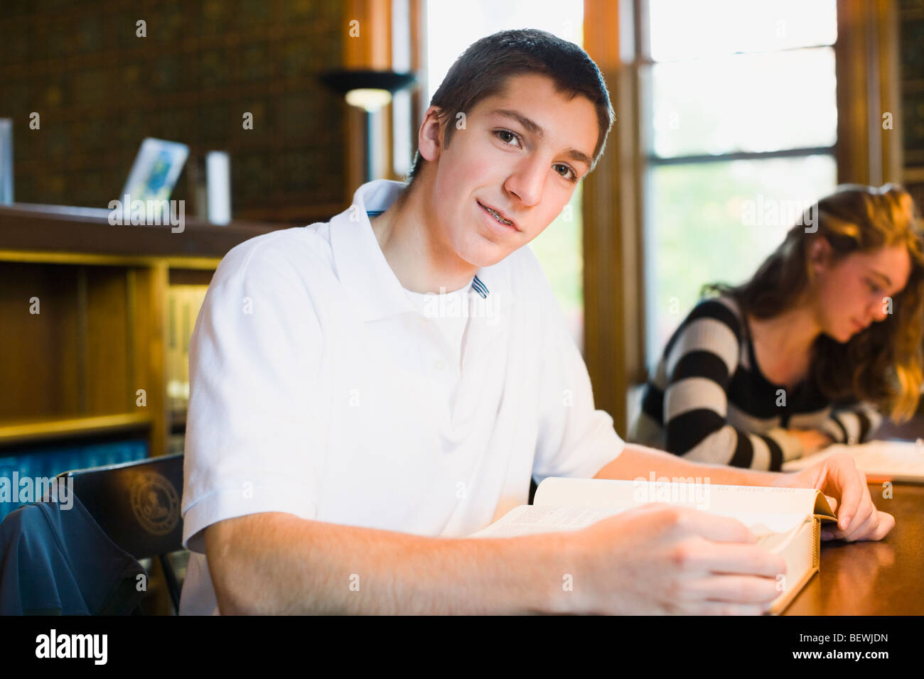 Students reading in a library Stock Photo - Alamy