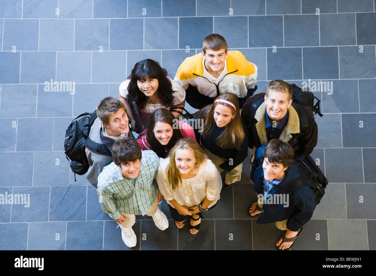 Group of students standing together and smiling Stock Photo - Alamy