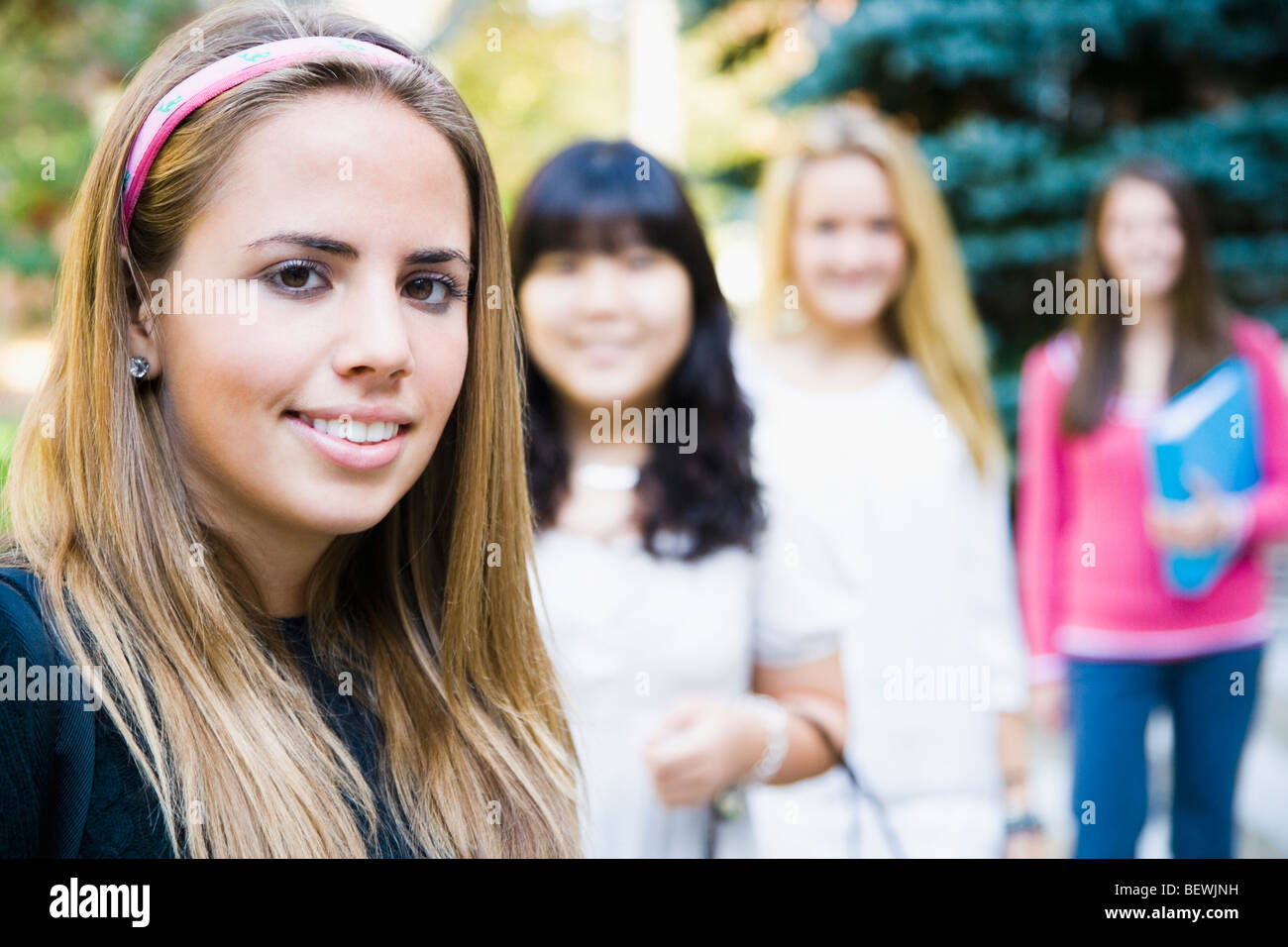 Students smiling in a campus Stock Photo - Alamy