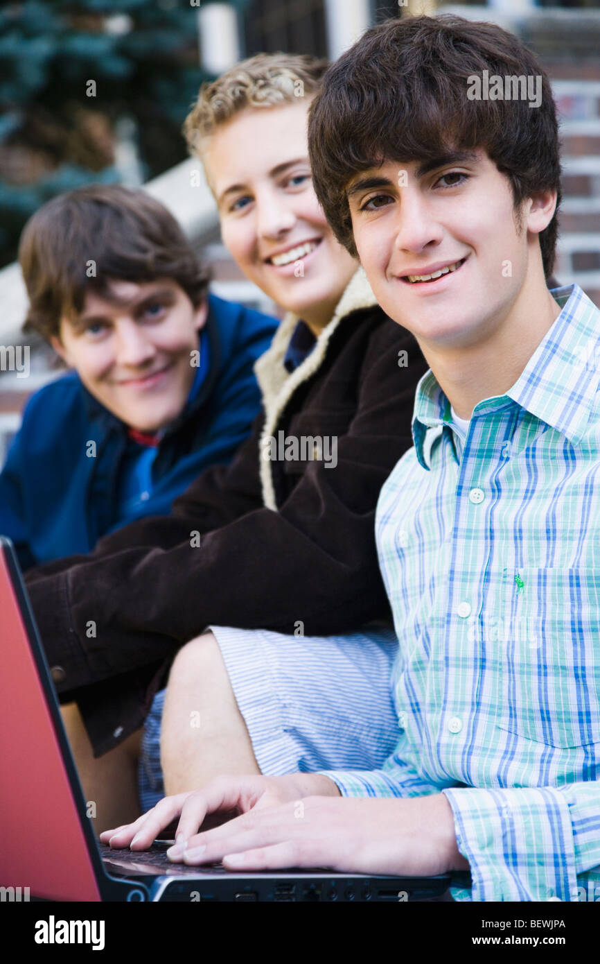 Students smiling in a campus Stock Photo - Alamy