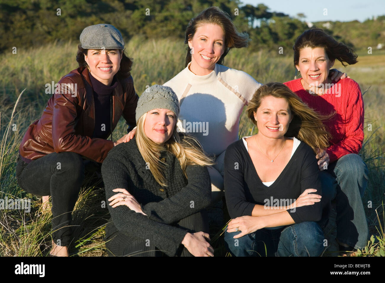 Portrait of five women on the beach Stock Photo - Alamy