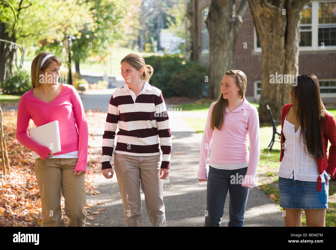 Students walking in a campus Stock Photo - Alamy