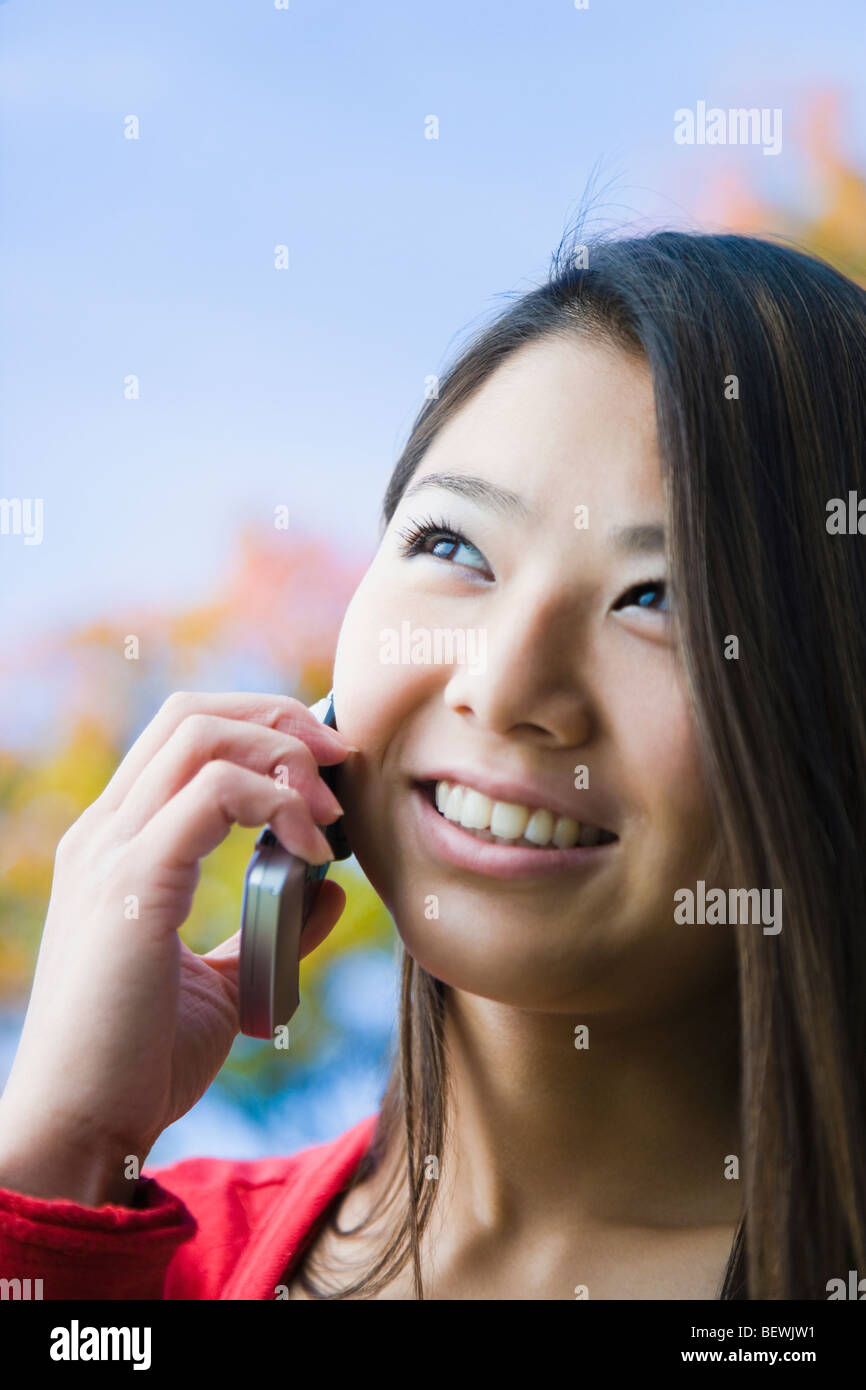 Student talking on a mobile phone Stock Photo - Alamy