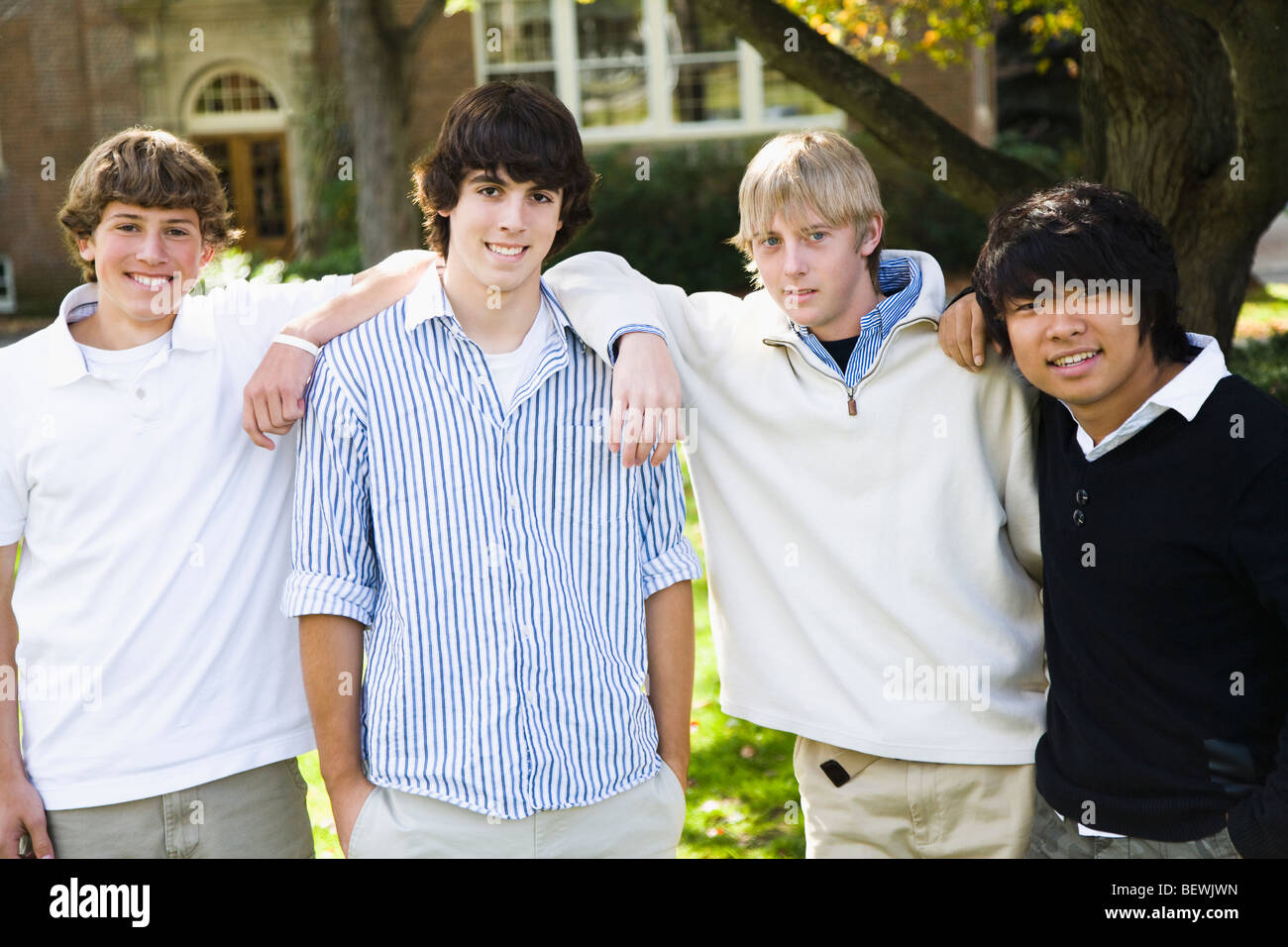 Students smiling in a campus Stock Photo - Alamy