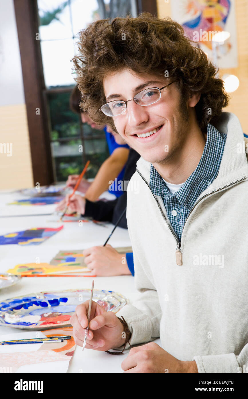 Man painting in art class hi-res stock photography and images - Alamy