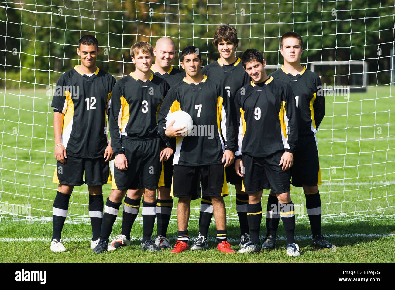 Soccer players in a soccer field Stock Photo - Alamy