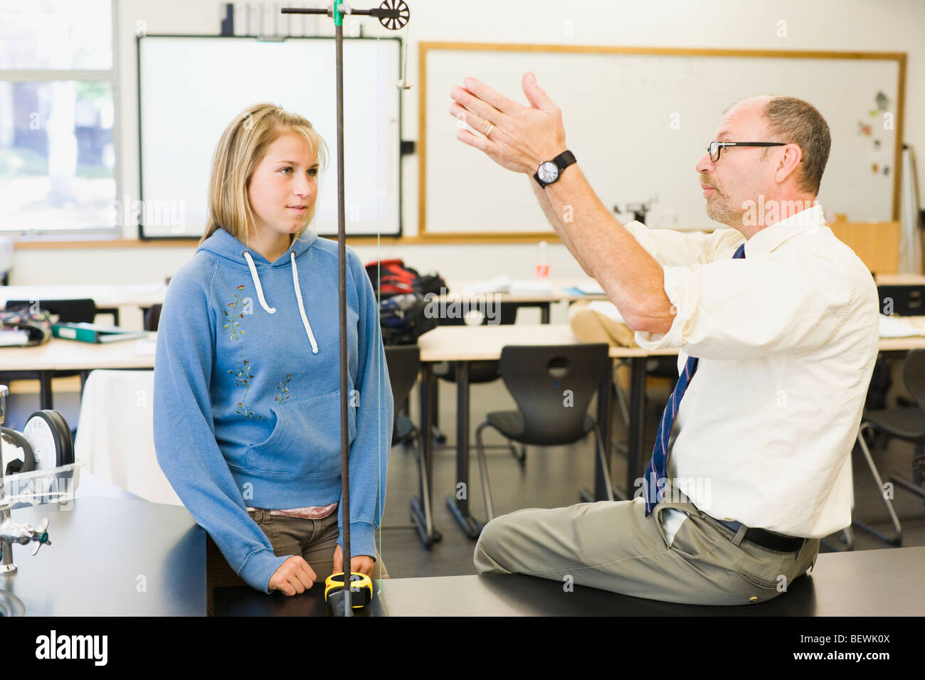 Professor explaining a student in a college laboratory Stock Photo - Alamy