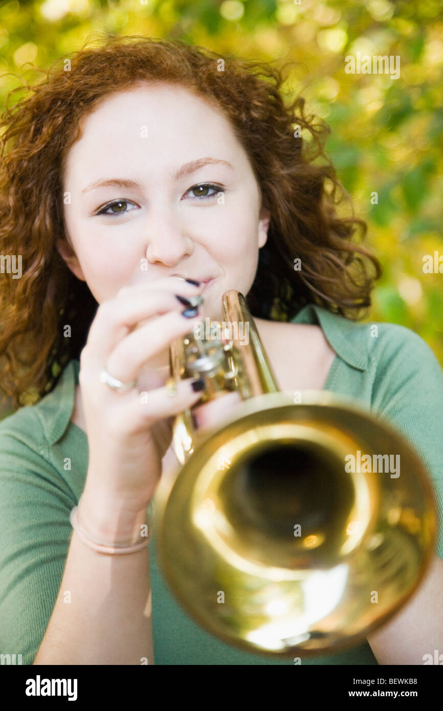 Woman playing trumpet hi-res stock photography and images - Alamy