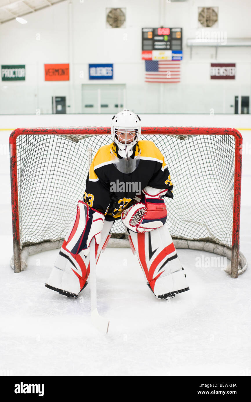 Goalkeeper at the goal post Stock Photo - Alamy