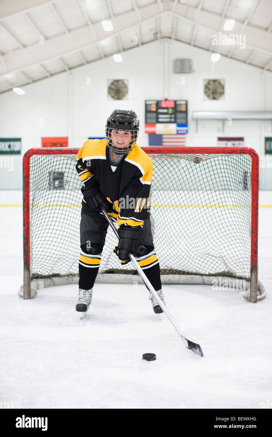 Goalkeeper at the goal post Stock Photo - Alamy