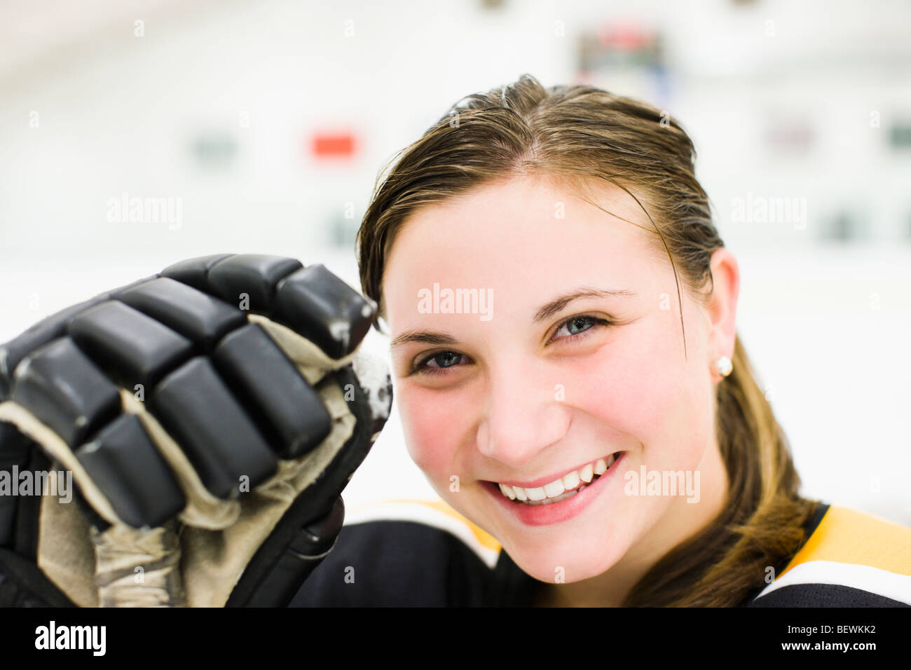 Portrait of an ice hockey player smiling Stock Photo - Alamy