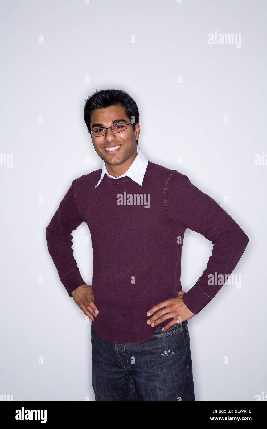 Young man standing alone Stock Photo - Alamy