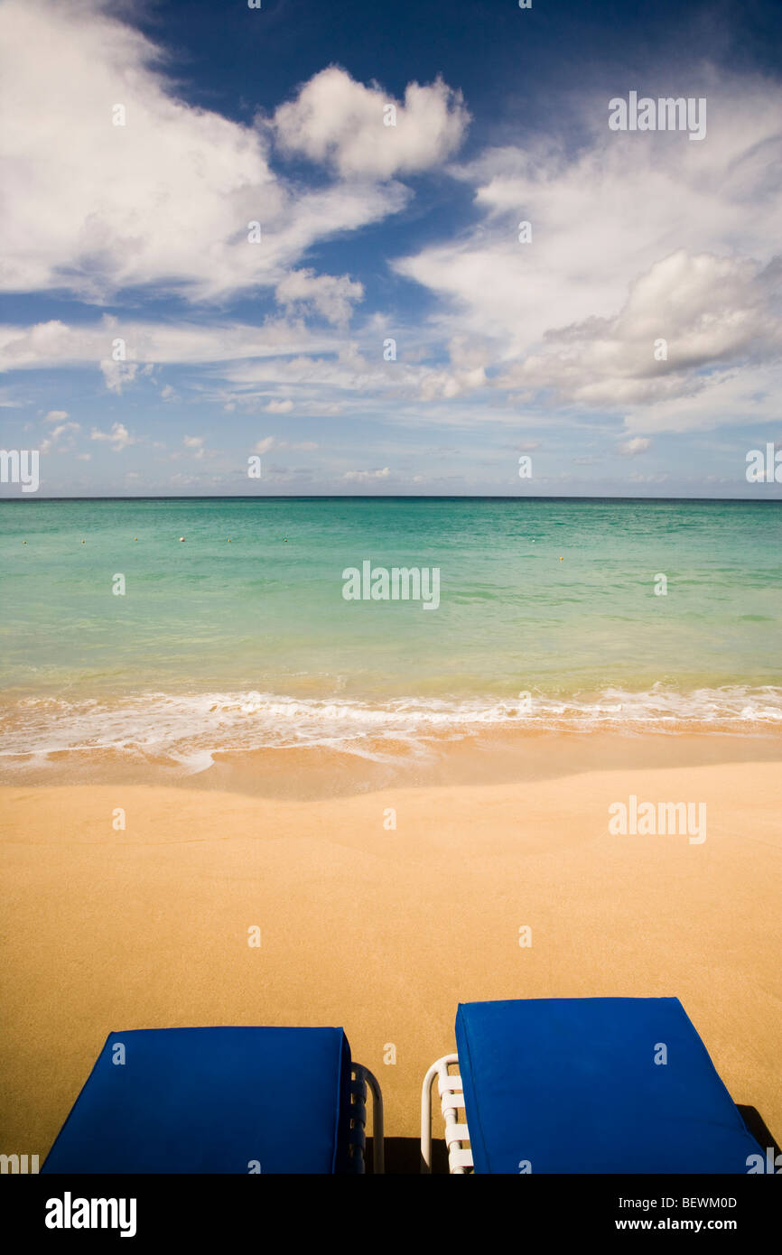 Lounge chairs on the beach Stock Photo - Alamy