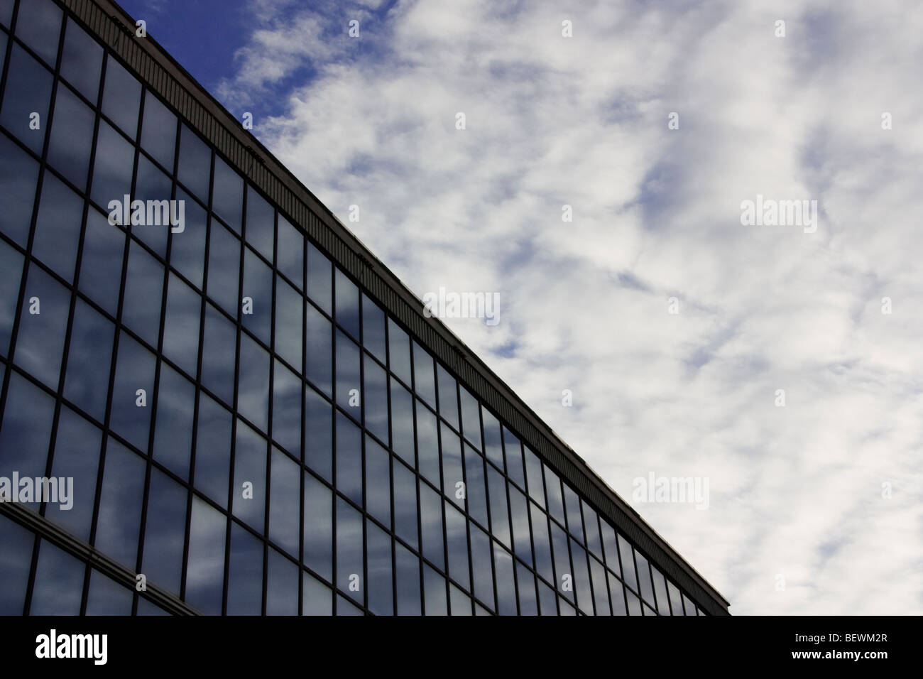 An office building with shadow of cloud Stock Photo - Alamy