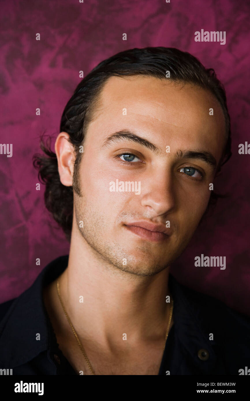 Close-up of a man looking sad Stock Photo - Alamy