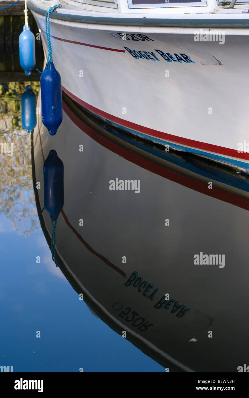 reflections in water of river cruiser hull Stock Photo - Alamy