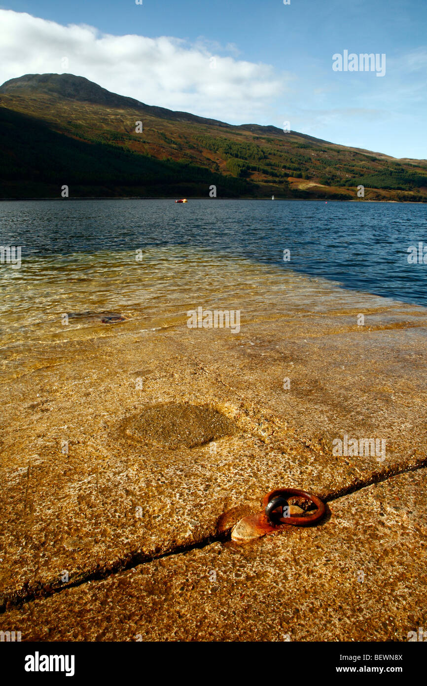 Concrete Ferry slipway with rusty iron mooring ring,Sgurr na Coinnich ...