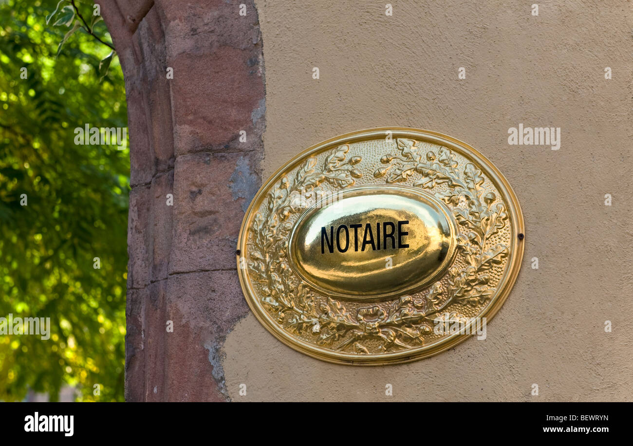 Moulded polished brass plaque sign depicting official french 'Notaire ...
