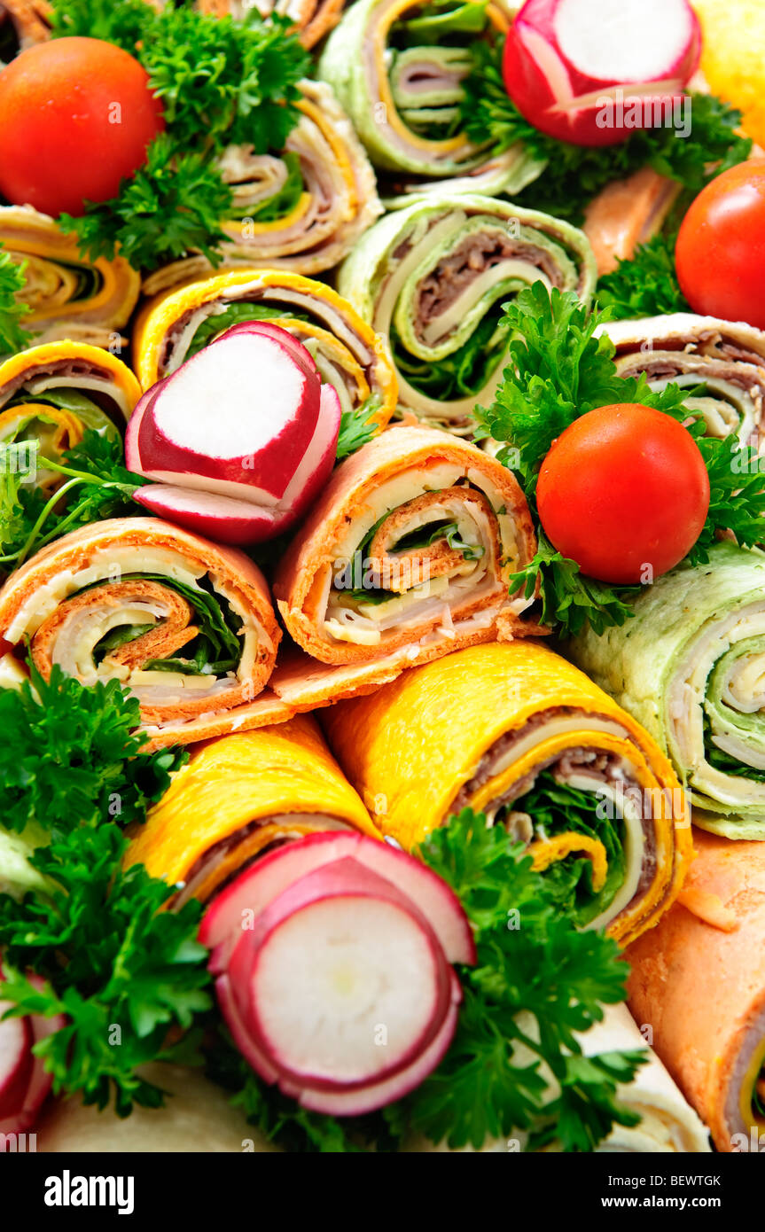 Closeup on platter of assorted meat tortilla wraps Stock Photo - Alamy