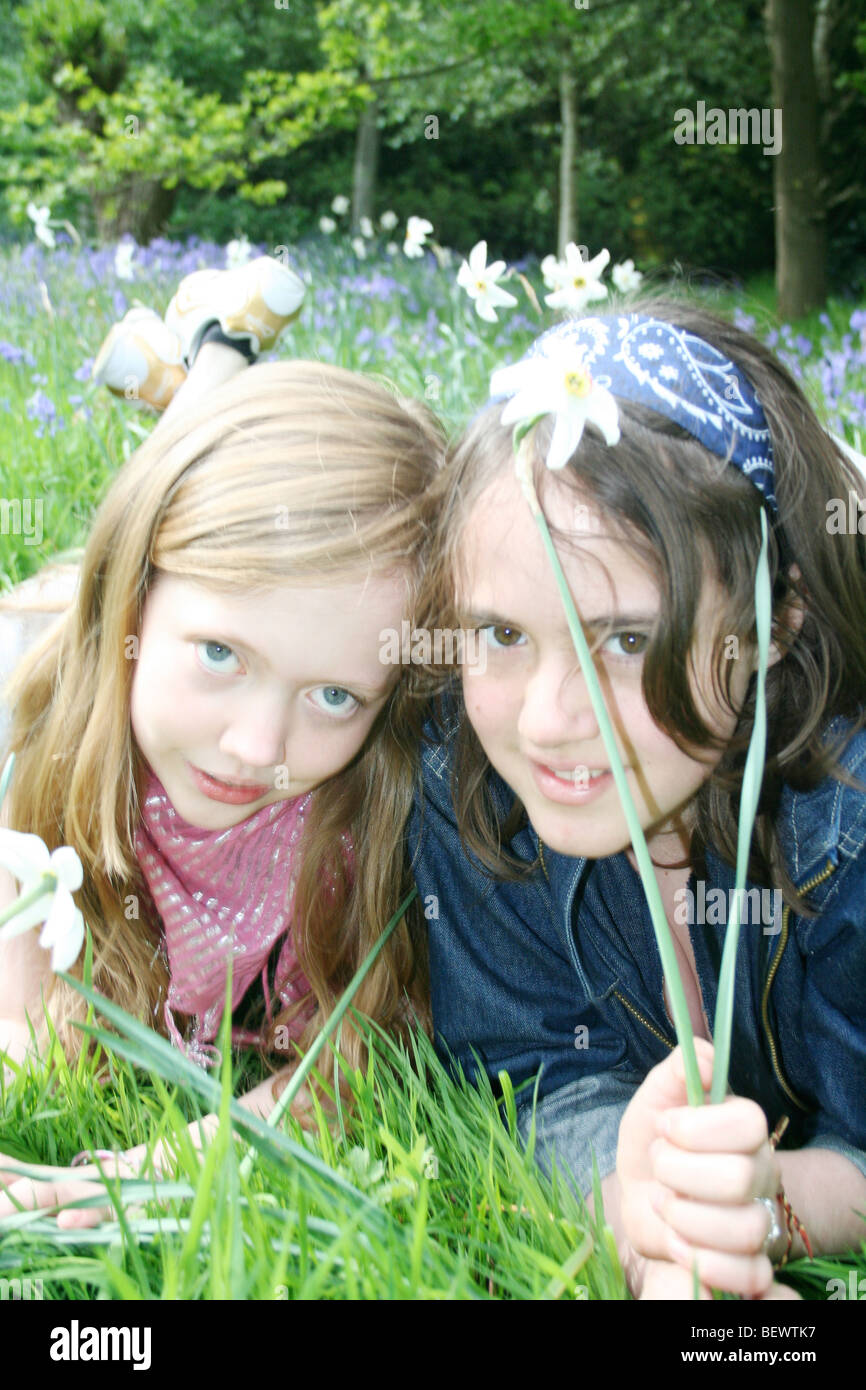 Two girls sharing secrets together hi-res stock photography and images ...