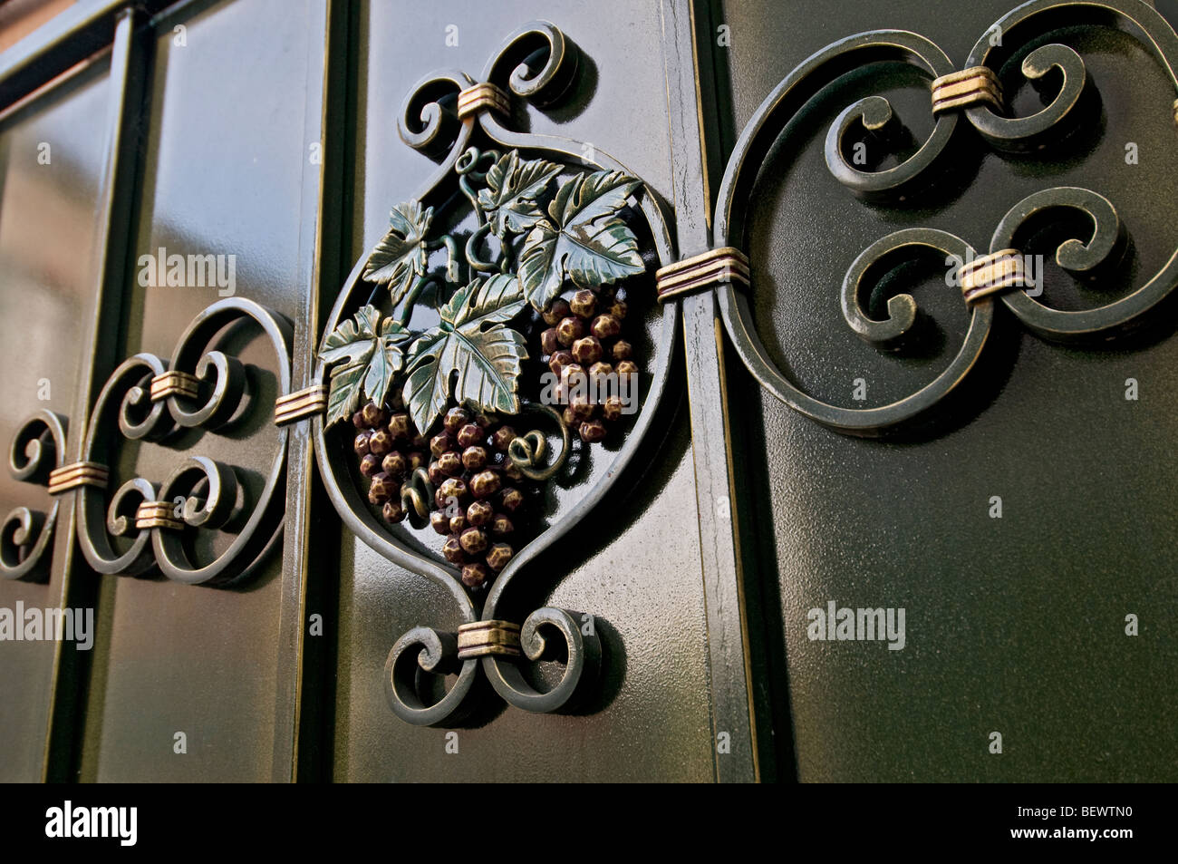 Grape engraving motif on winemakers grand entrance gateway outside ...