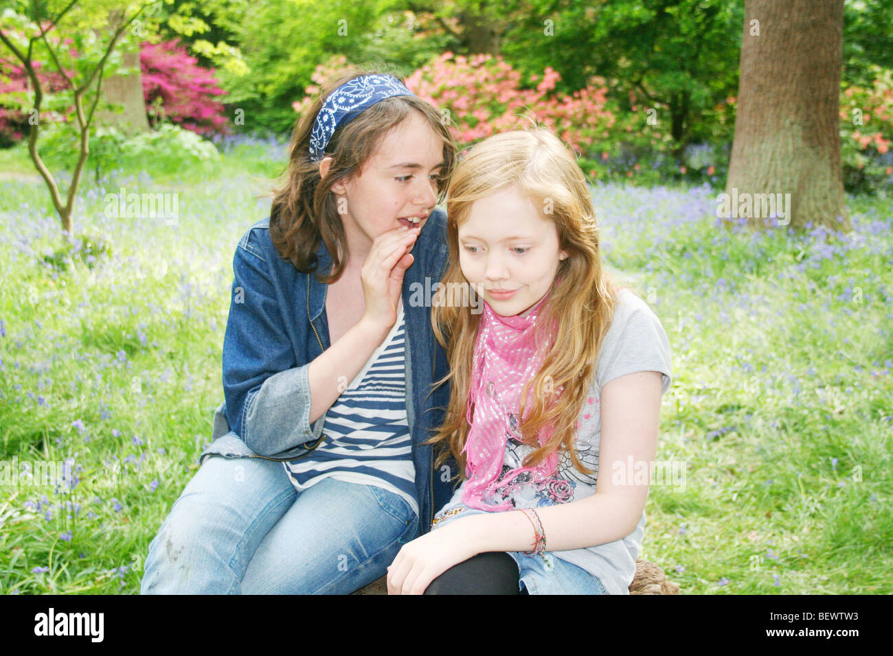 children sharing secrets Stock Photo - Alamy