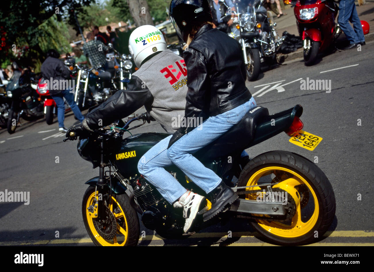 Kawasaki Z1105 motorcycle with rider and pillion passenger Stock Photo ...