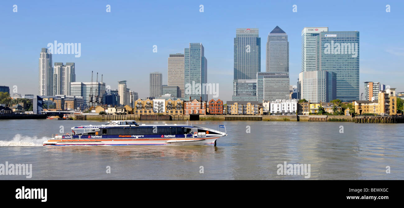 Thames clipper fast catamaran river waterbus service passing Canary ...
