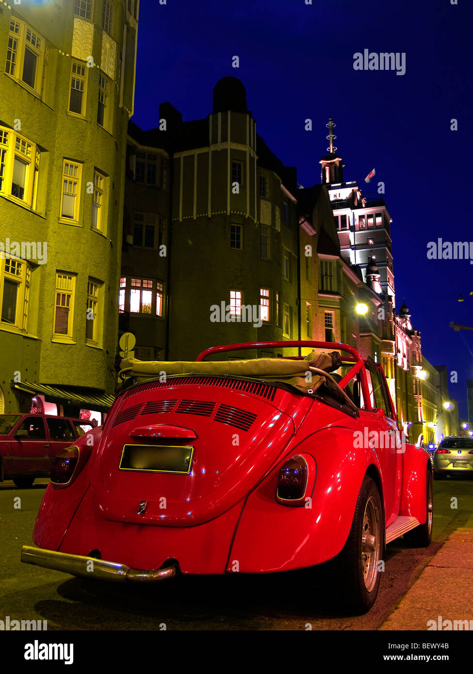 Classic Car parked on illuminated Night Street Stock Photo - Alamy