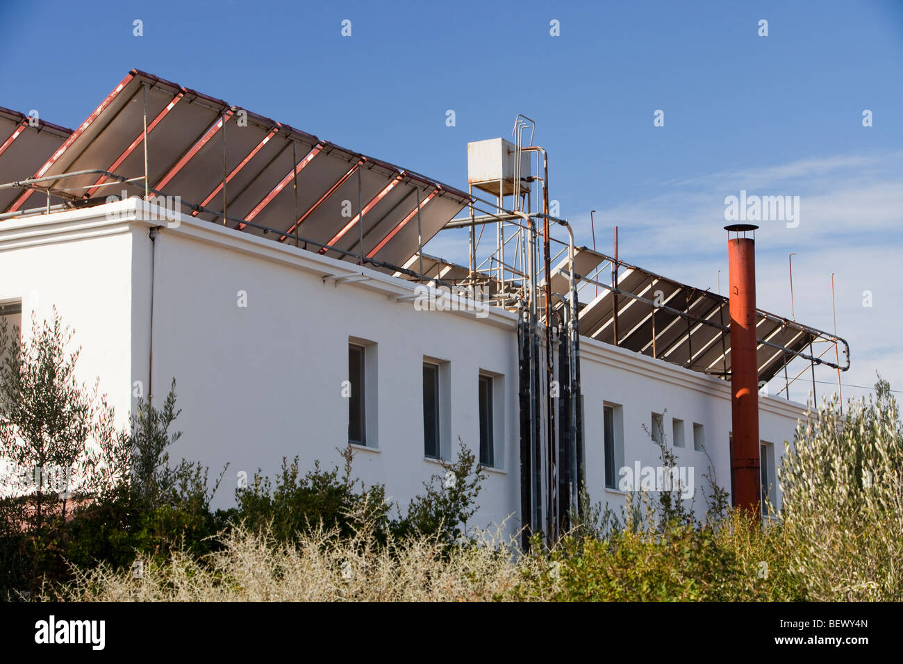 Solar water heating panels on the roof of a launderette in Teos ...