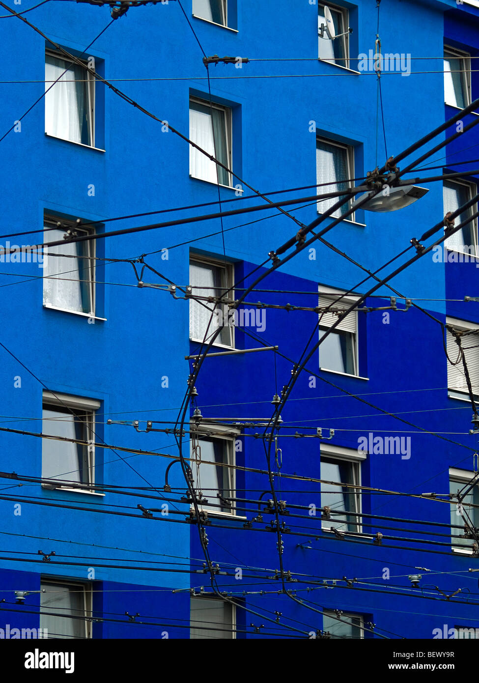 Wires on house background Stock Photo - Alamy
