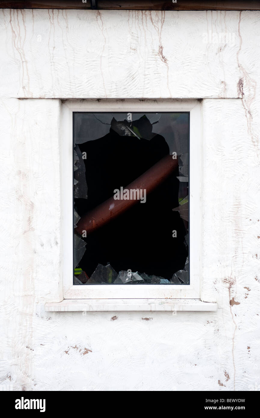 Fire hose seen through window of house on fire Stock Photo - Alamy