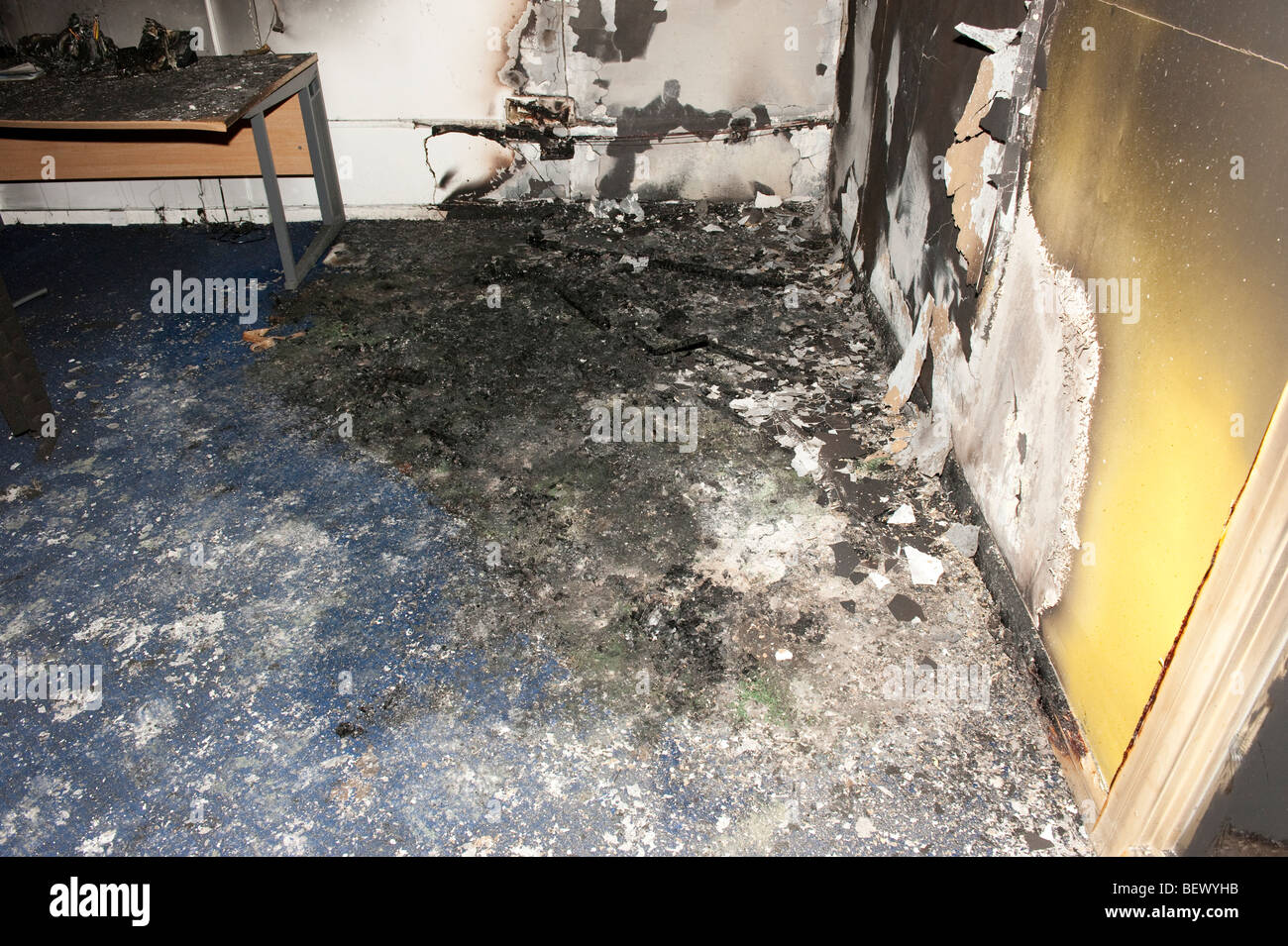 Office fire showing damage and burnt desks Stock Photo - Alamy