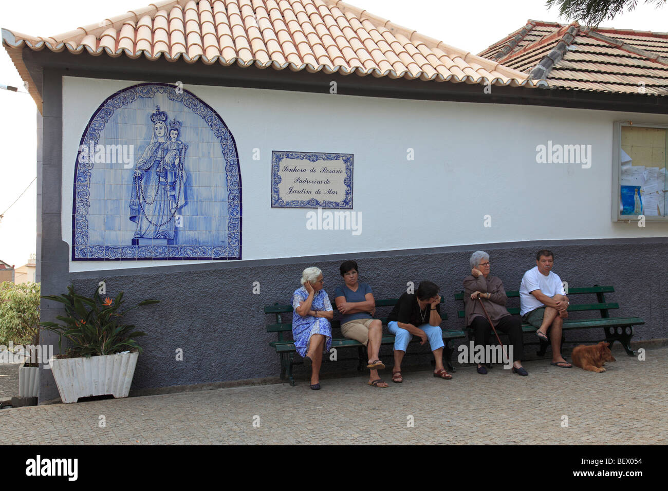 local people sitting at the square of Jardim do Mar, Madeira, Portugal ...