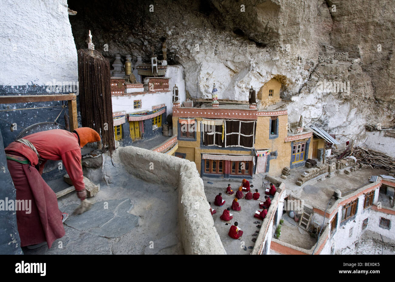 Novice monks studying. Phuktal monastery. Zanskar. India Stock Photo ...