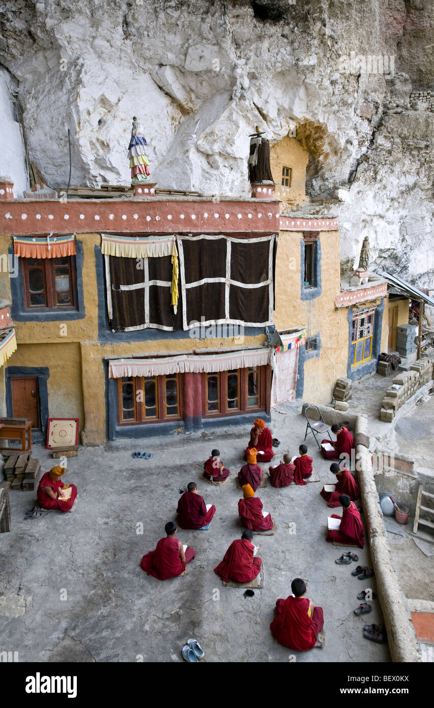 Novice monks studying. Phuktal monastery. Zanskar. India Stock Photo ...