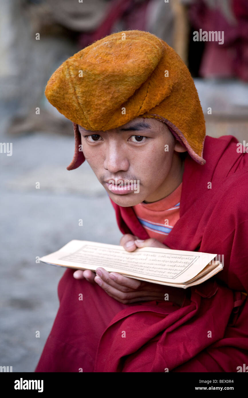 Novice monk reciting the sacred texts. Phugtal monastery. Zanskar ...