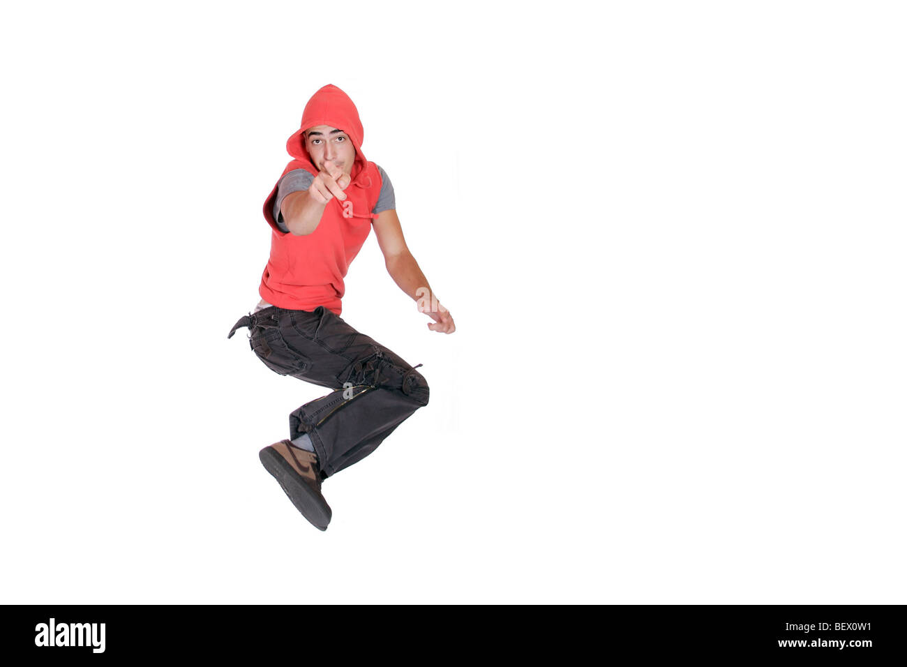 A handsome young man jumping isolated on white Stock Photo - Alamy