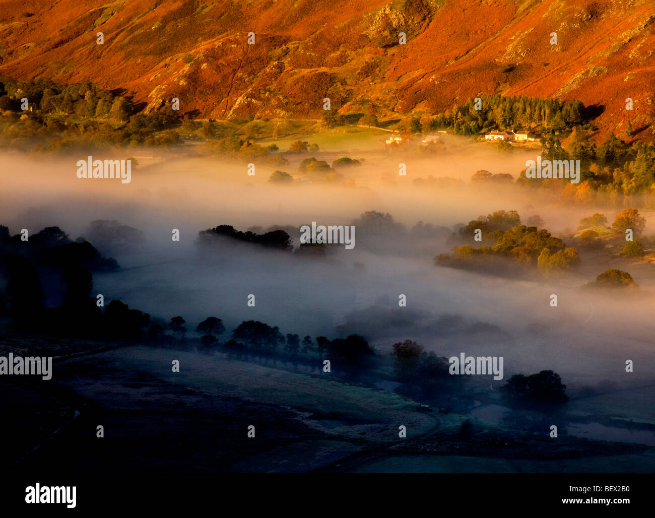Early morning mist on valley floor Stock Photo - Alamy