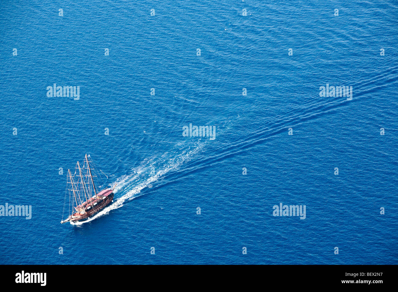 Beautiful brigantine boat in turquoise sea waters Stock Photo - Alamy