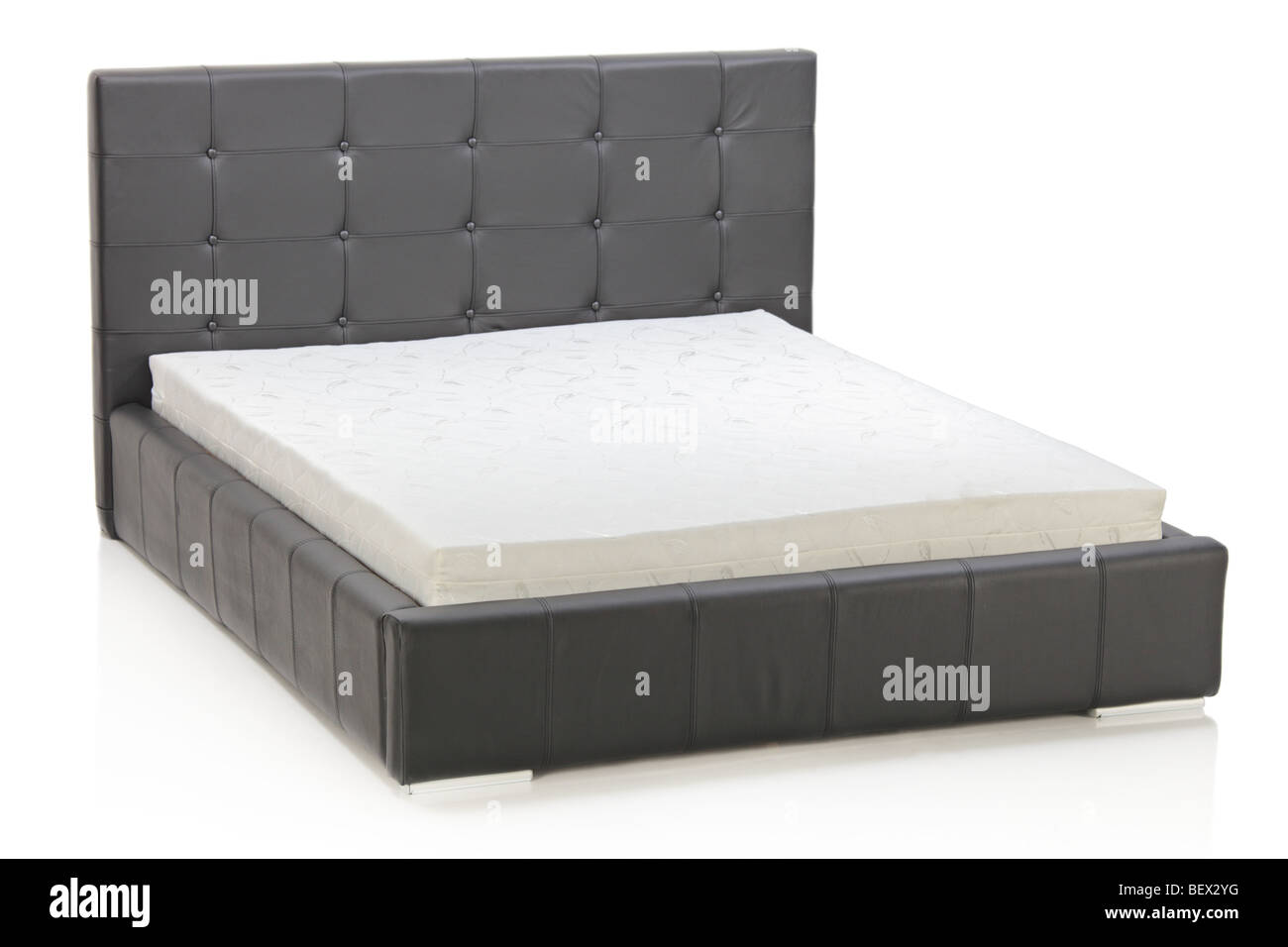 Modern double bed isolated on white background Stock Photo - Alamy
