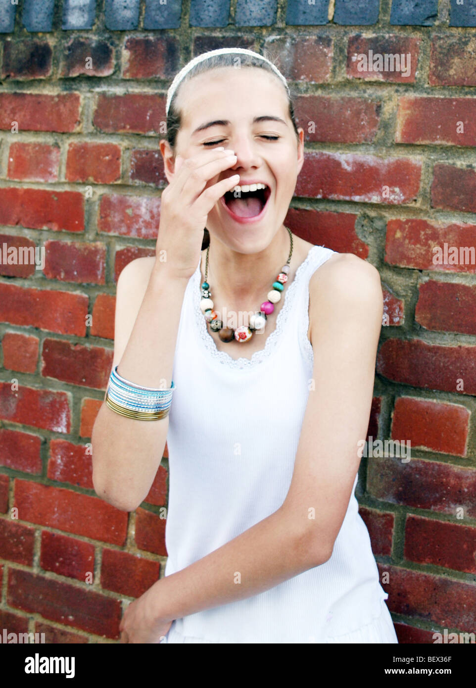 girl crying with laughter Stock Photo - Alamy