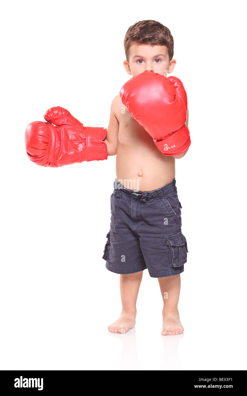 Kid with red boxing gloves isolated on white background Stock Photo - Alamy